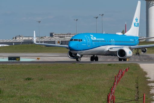 Boeing 737-8K2 plane of the airline KLM moving on the runway at Lisbon ...
