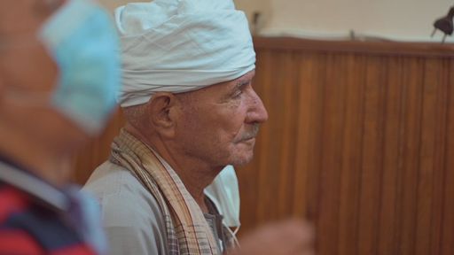 Egyptian people singing, clapping, and playing music, at a gathering in ...