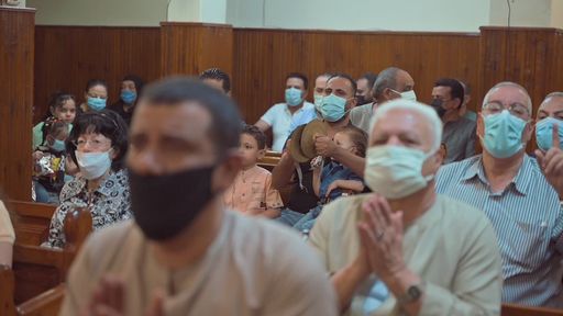Egyptian people singing, clapping, and playing music, at a gathering in ...