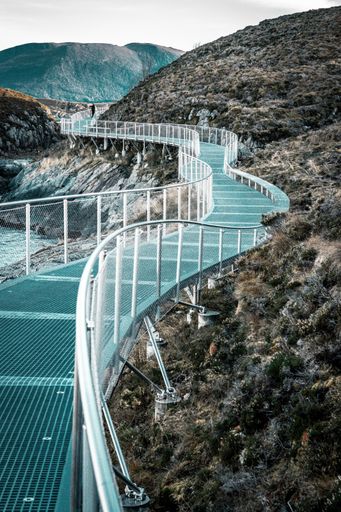 Unique winding bridge along a part of the Norwegian sea; the area of ...