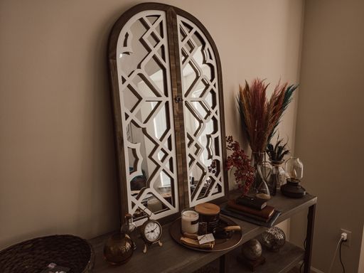 Shawn Mirza| Unique ornate mirror with a wooden frame surrounded by ...