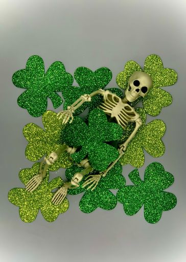 Mystical Orchid Photography | Small plastic skeleton toy lying in ...